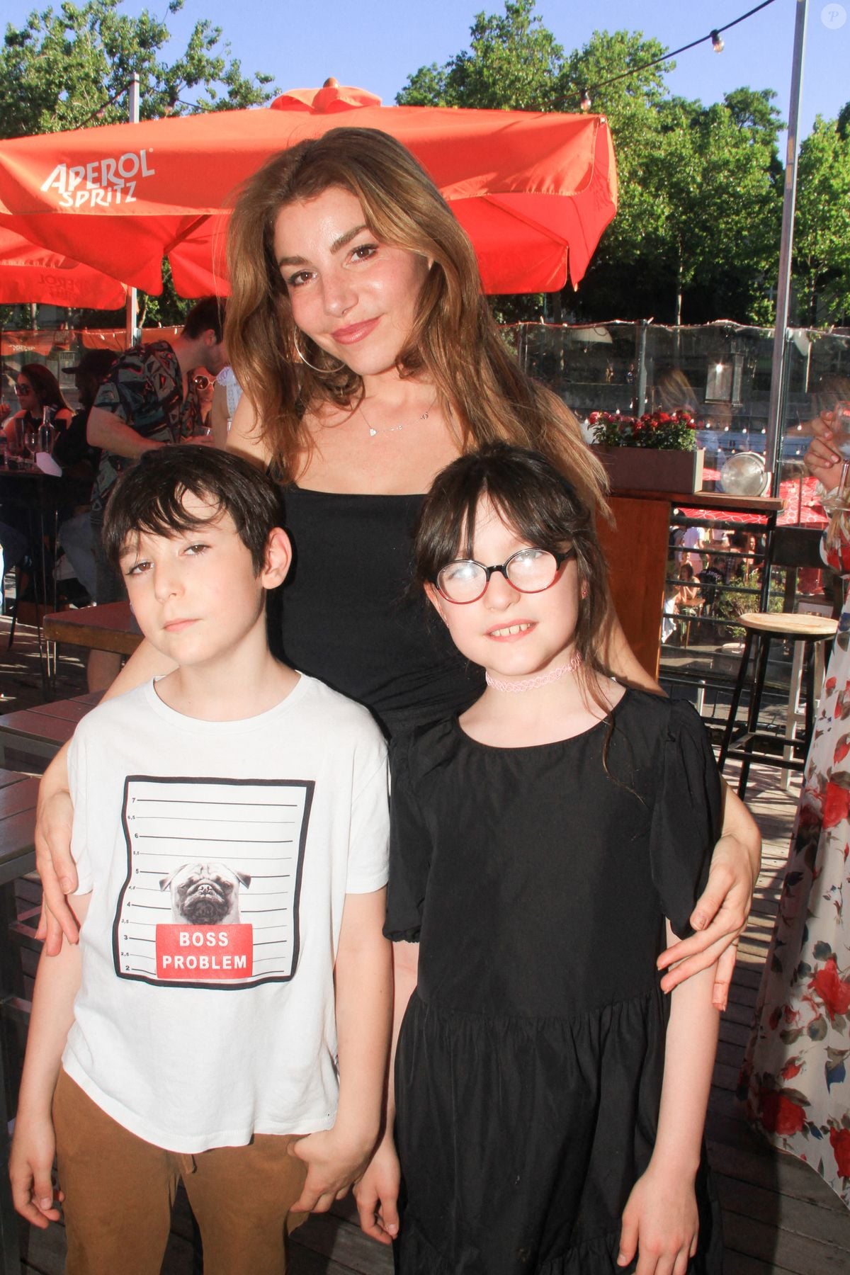 Photo : ce qui l'éloigne alors de ses enfants, les jumeaux Bella et ...