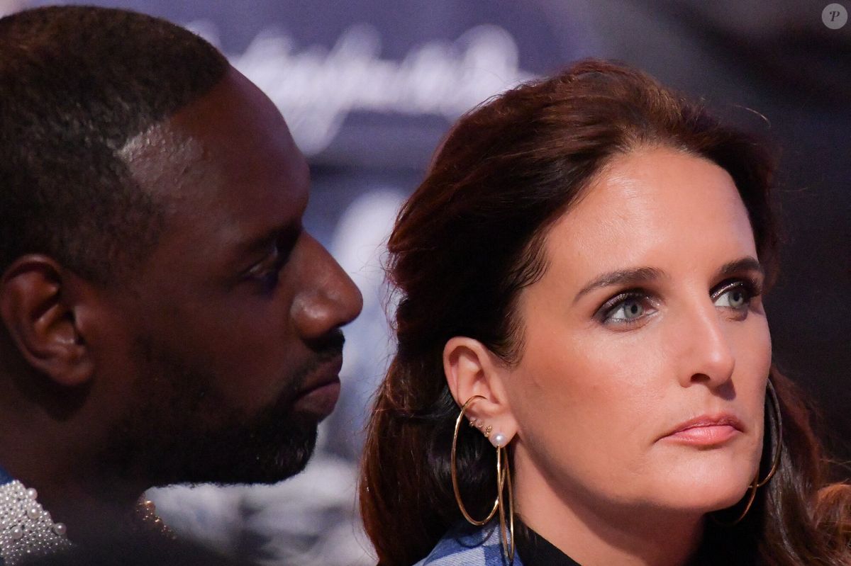 Photo : Omar Sy et son épouse Hélène Sy, au premier rang du défilé ...