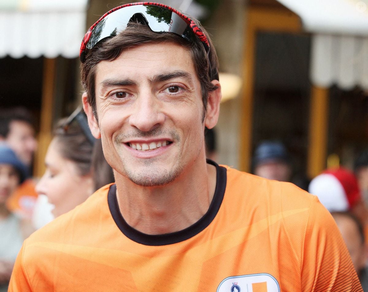 Photo : Claude Dartois (Koh Lanta) lors du marathon Orange Night Run ...